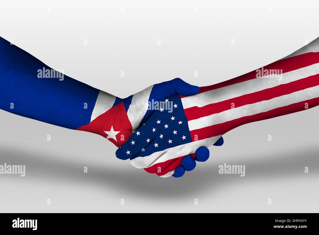 Handshake between united states of america and cuba flags painted on ...
