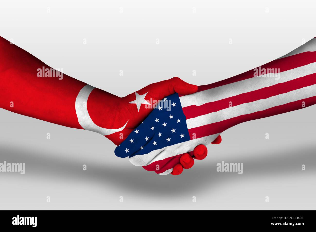 Handshake between united states of america and turkey flags painted on ...