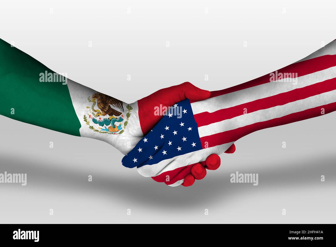 Handshake between united states of america and mexico flags painted on ...