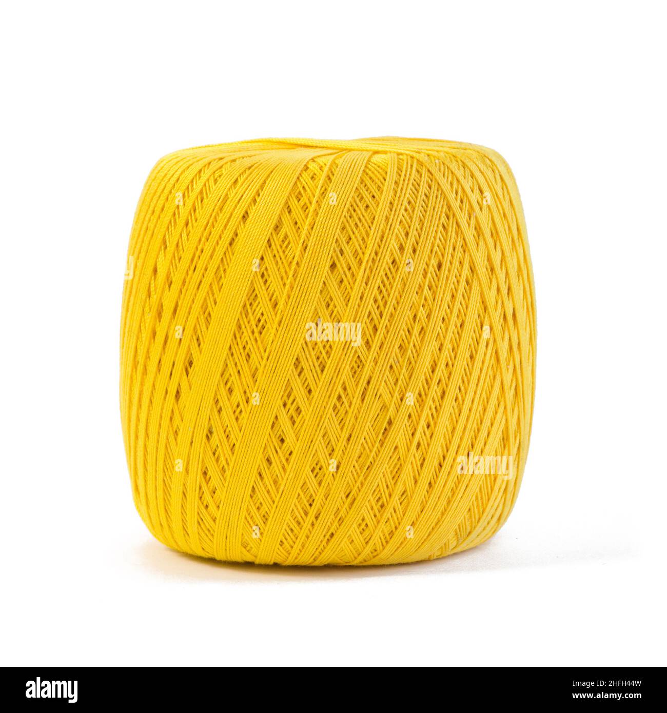 Balls of yellow yarn isolated on white background. Threads of wool boho ...