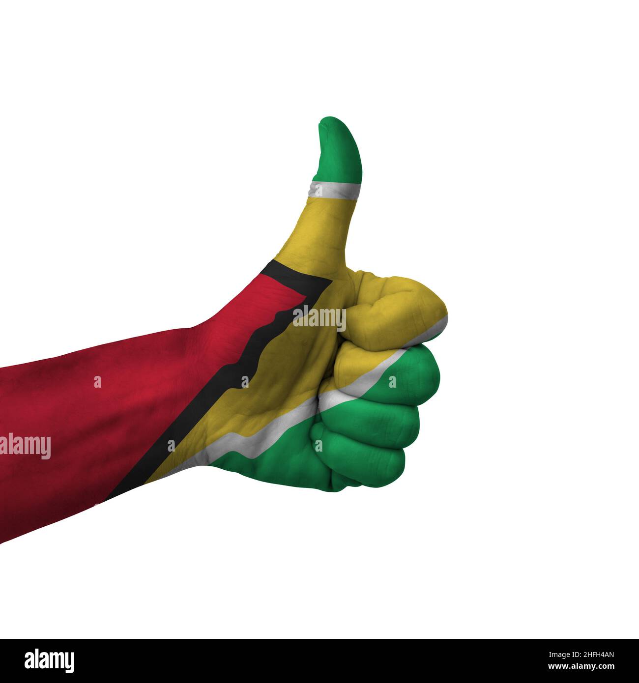 Hand making thumbs up sign, guyana painted with flag as symbol of ...