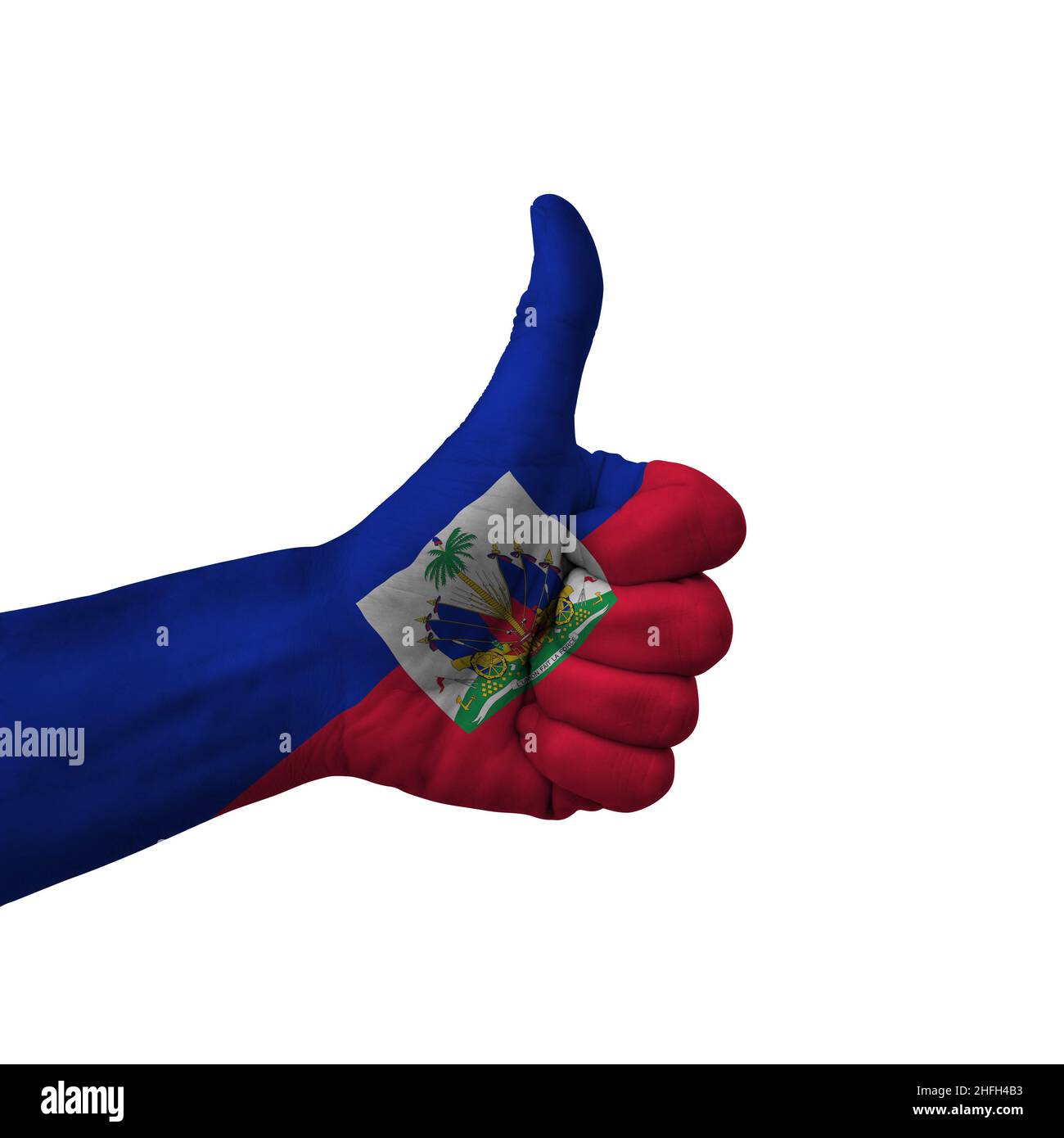 Hand making thumbs up sign, haiti painted with flag as symbol of thumbs ...