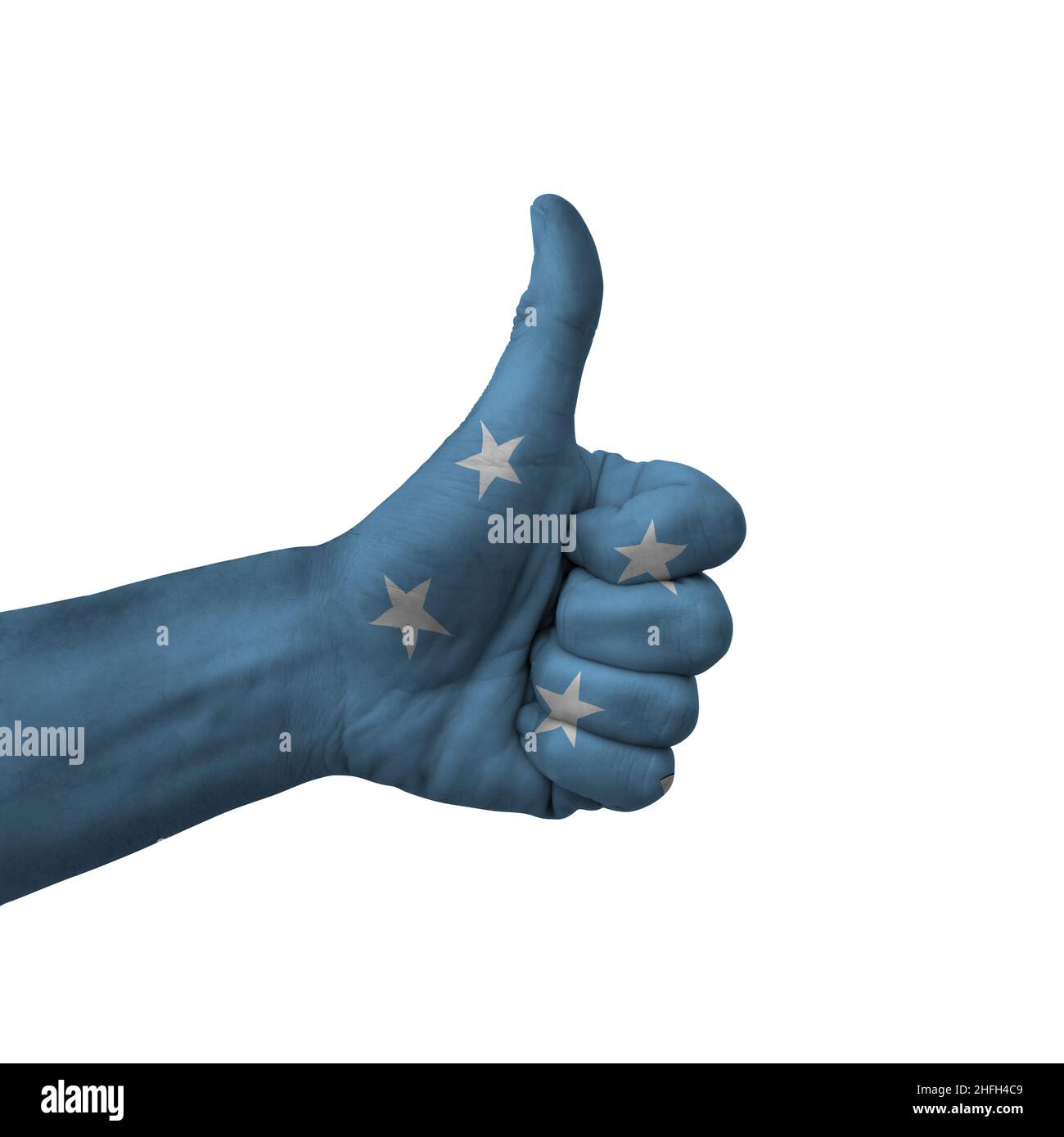 Hand making thumbs up sign, micronesia painted with flag as symbol of ...