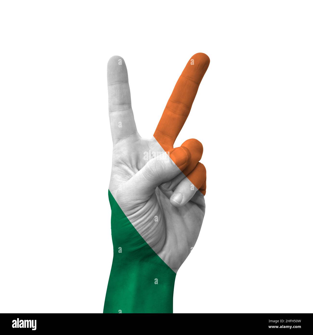 Hand making victory sign, ireland painted with flag as symbol of ...