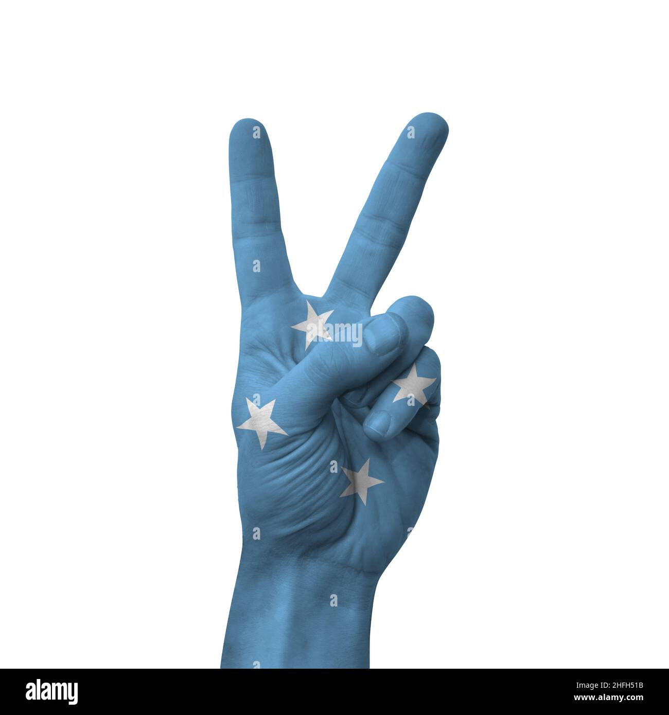 Hand making victory sign, micronesia painted with flag as symbol of ...