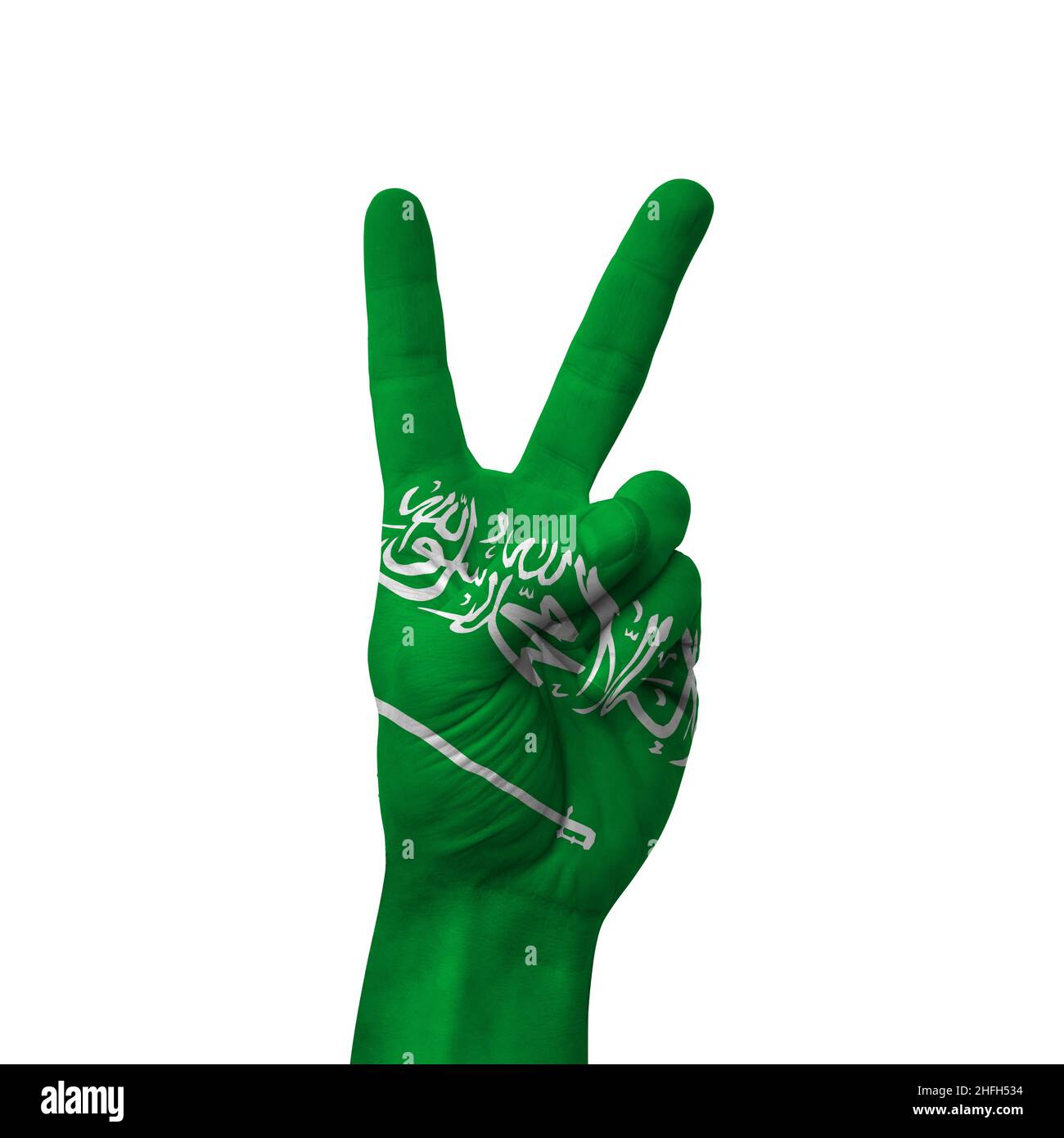 Hand making victory sign, saudi arabia painted with flag as symbol of ...