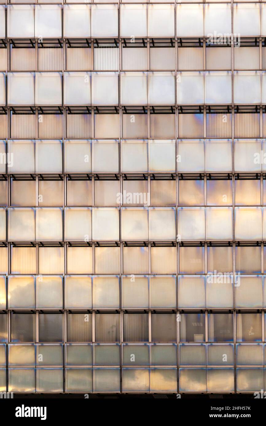 reflection of sky and clouds in a facade of a skyscraper Stock Photo ...