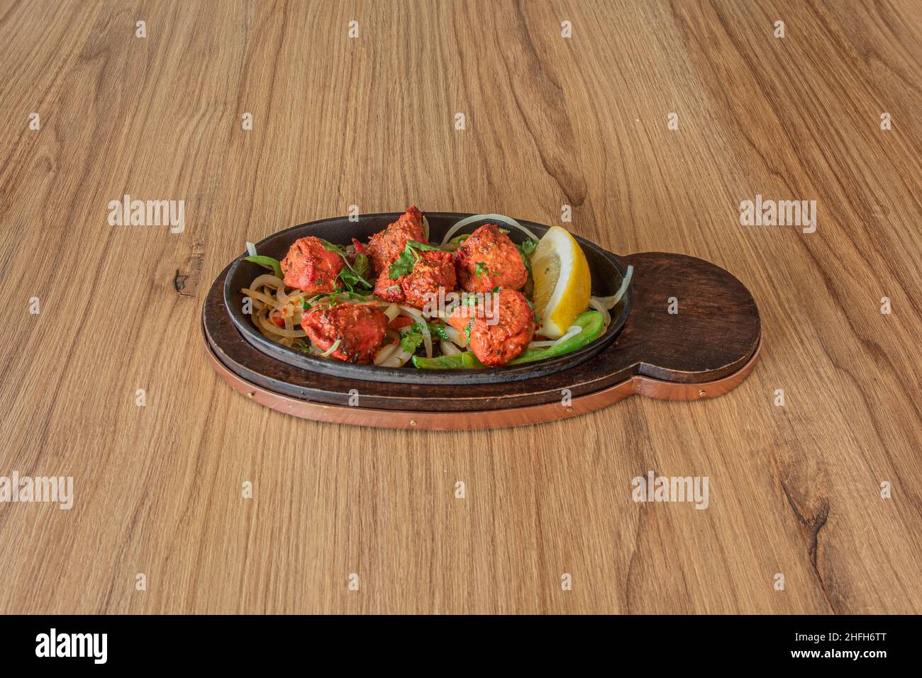 Indian chicken tikka dish served in masala sauce and beef broth. They ...