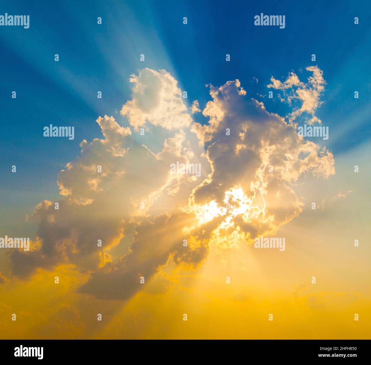 Sunset with sun rays Stock Photo - Alamy