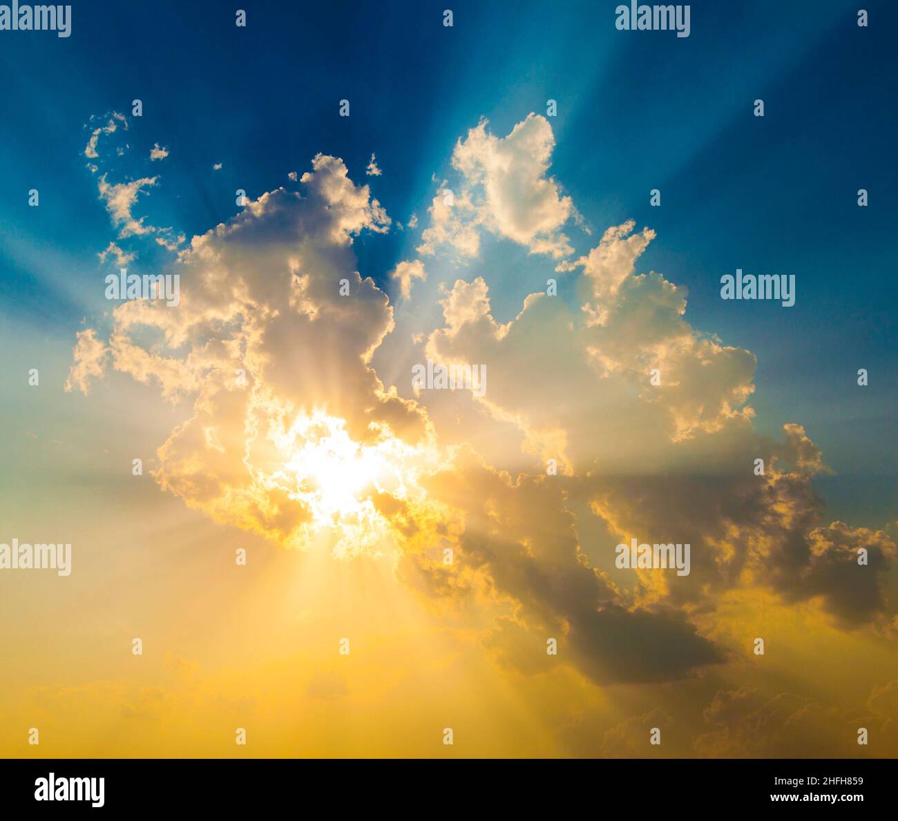 Sunset with sun rays Stock Photo - Alamy