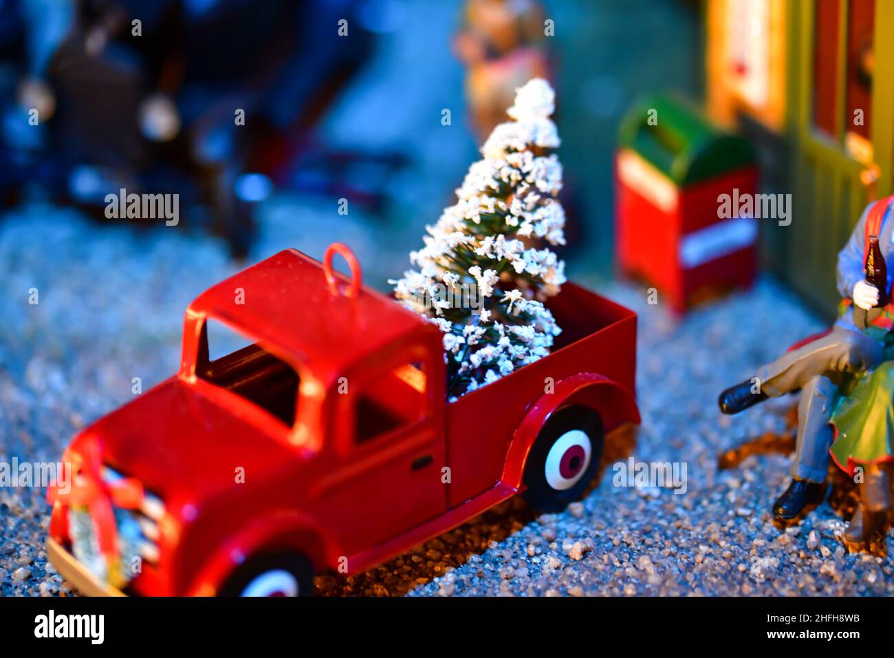 Christmas decorations on toy model train set Stock Photo - Alamy