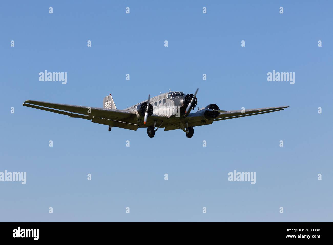 an old three-engine airliner in flight, the Ju 52 Stock Photo - Alamy