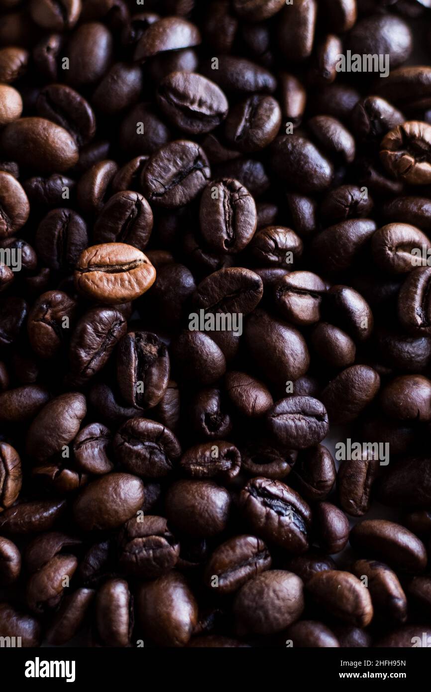 Coffee beans texture and background for design. Close up of coffee ...