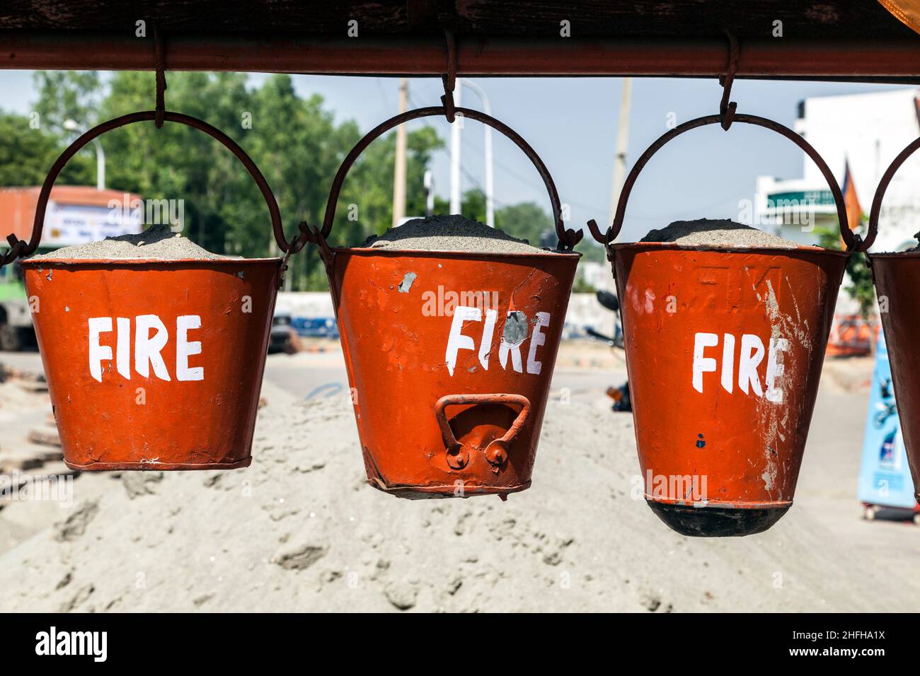 bucket with sand in a petrol station for fire fighting Stock Photo - Alamy