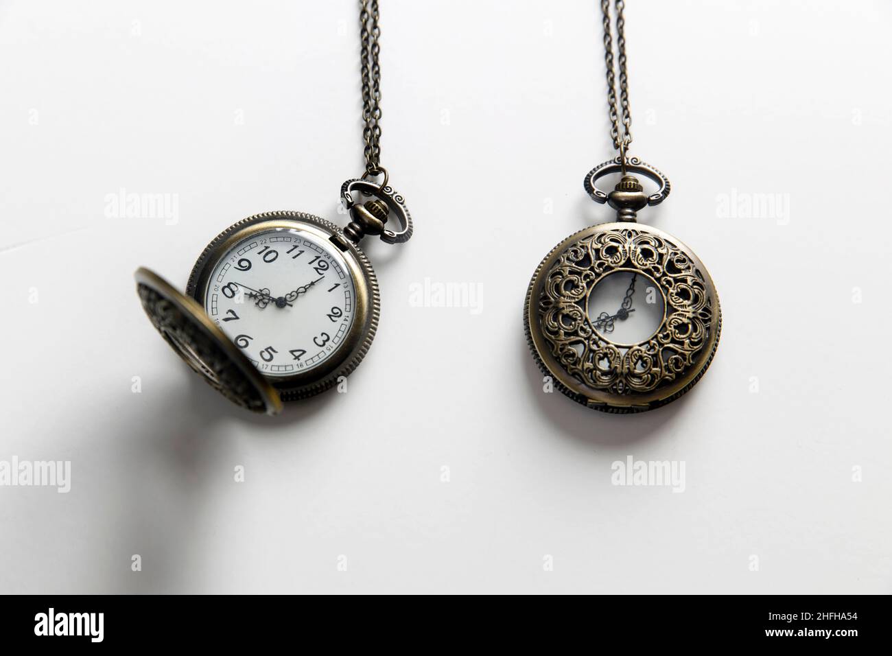Pocket watch with chain closed and open on white background Stock Photo ...