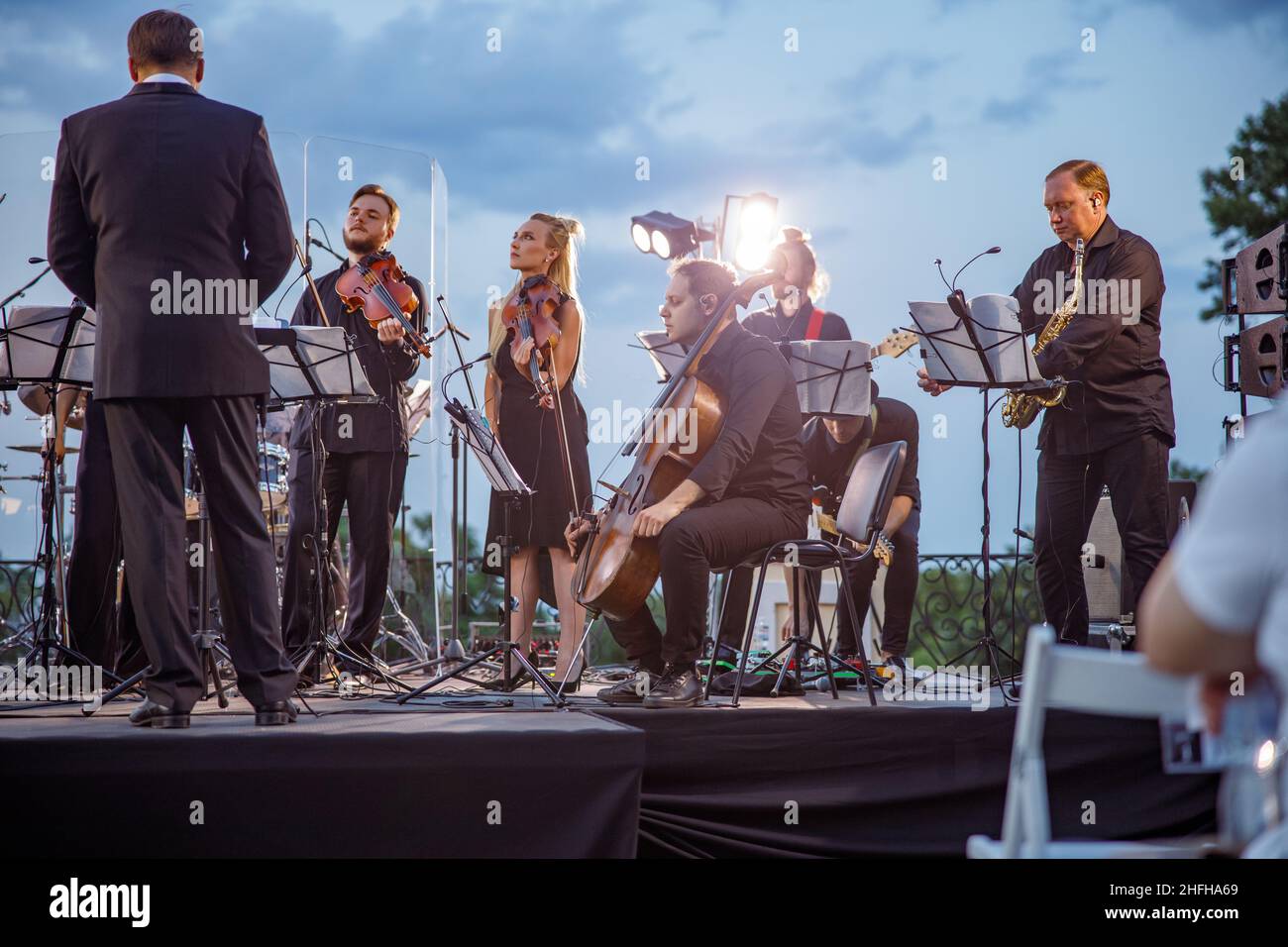 Musical ensemble giving orchestral concert on the street Stock Photo ...