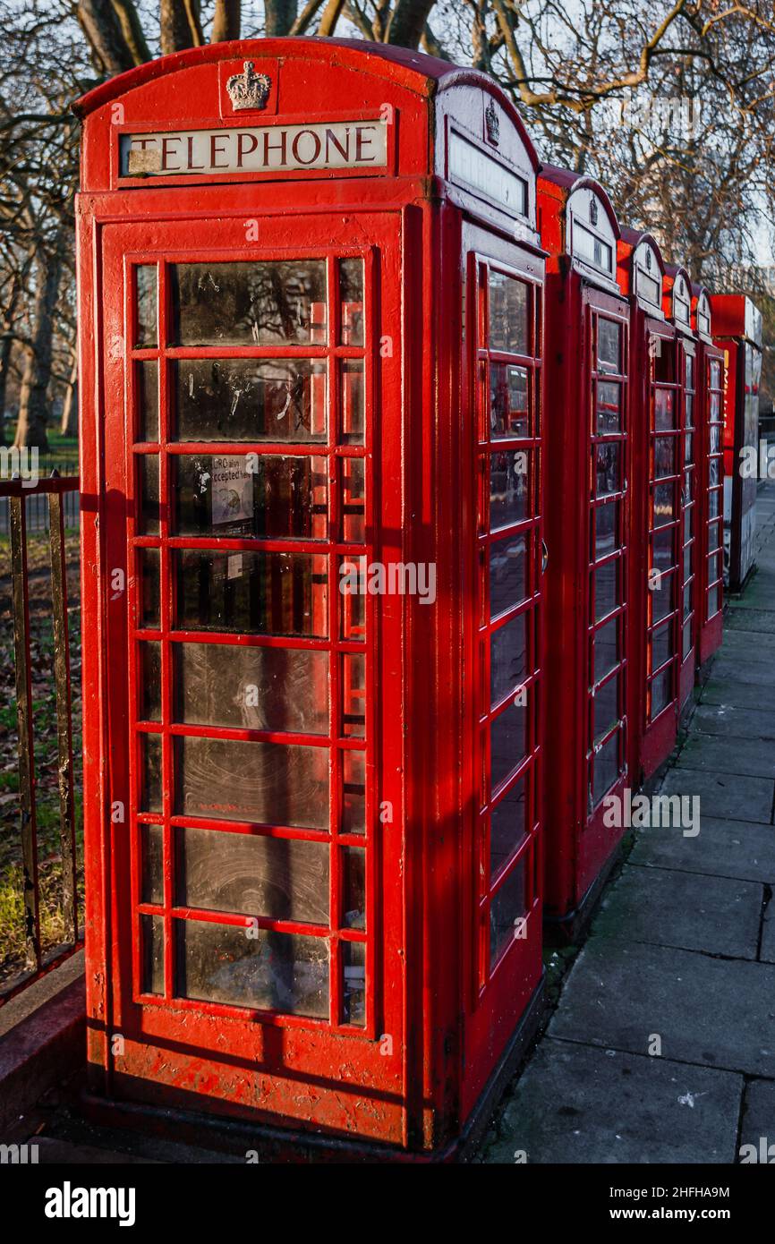 A row of old iconic London telephone boxes Stock Photo - Alamy