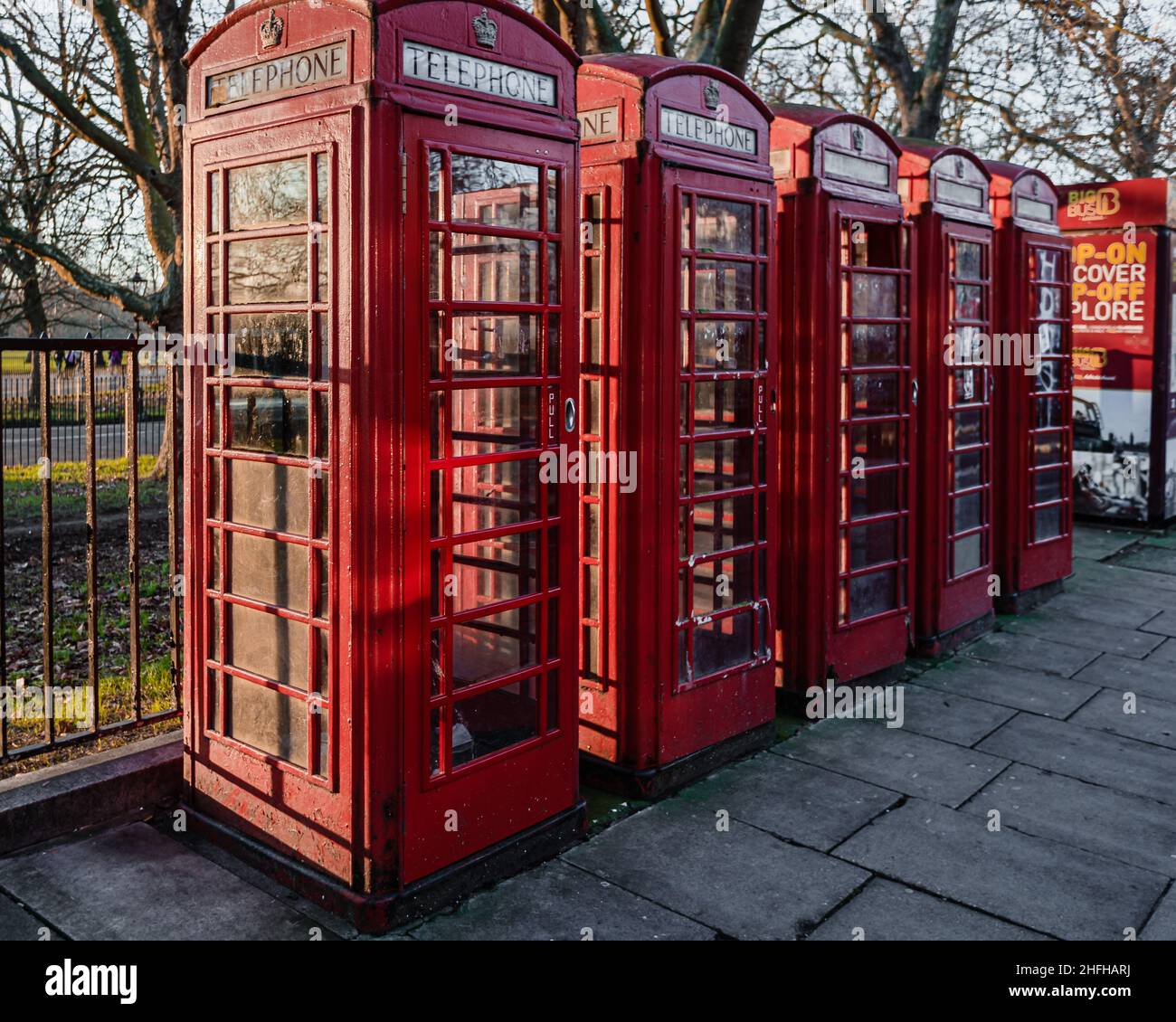 A row of old iconic London red telephone boxes Stock Photo - Alamy
