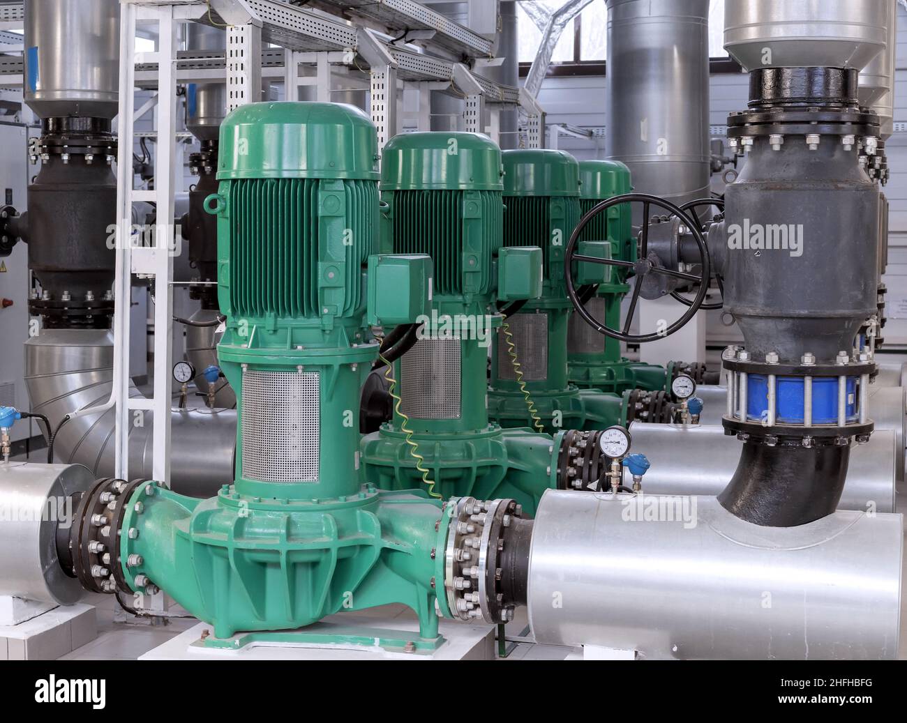 Engines and network pumps on the pipeline in the gas boiler room Stock ...