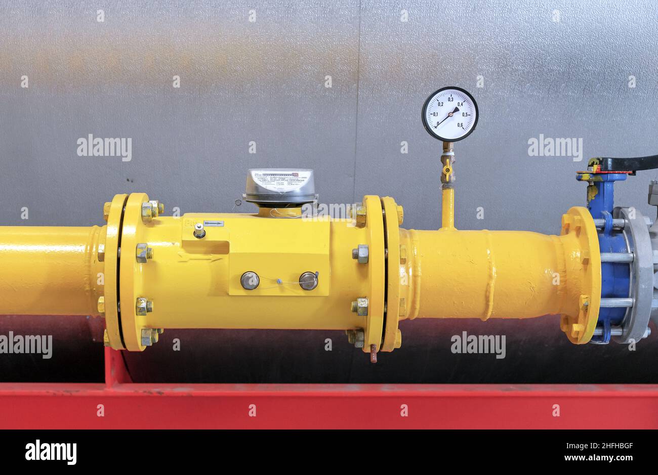 Gas meter and pressure gauge on a gas pipeline in a gas boiler room ...