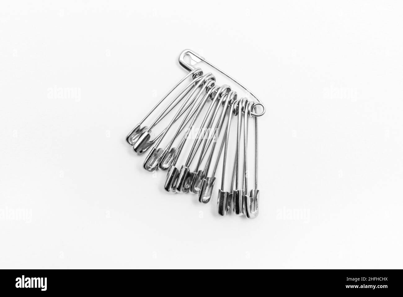 Office pins on paper Cut Out Stock Images & Pictures - Alamy
