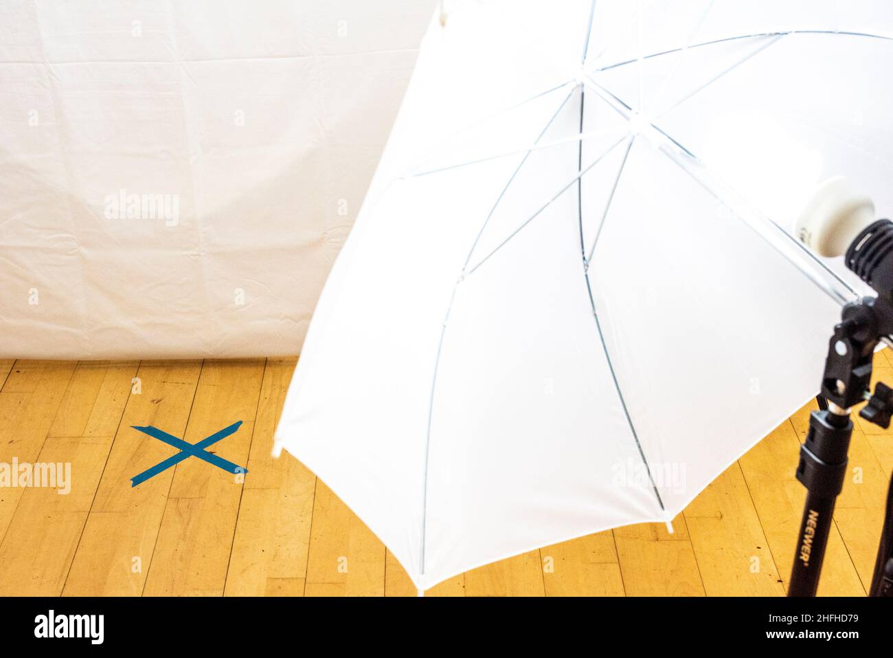 X marking the spot for models to stand for studio photography. Masking ...