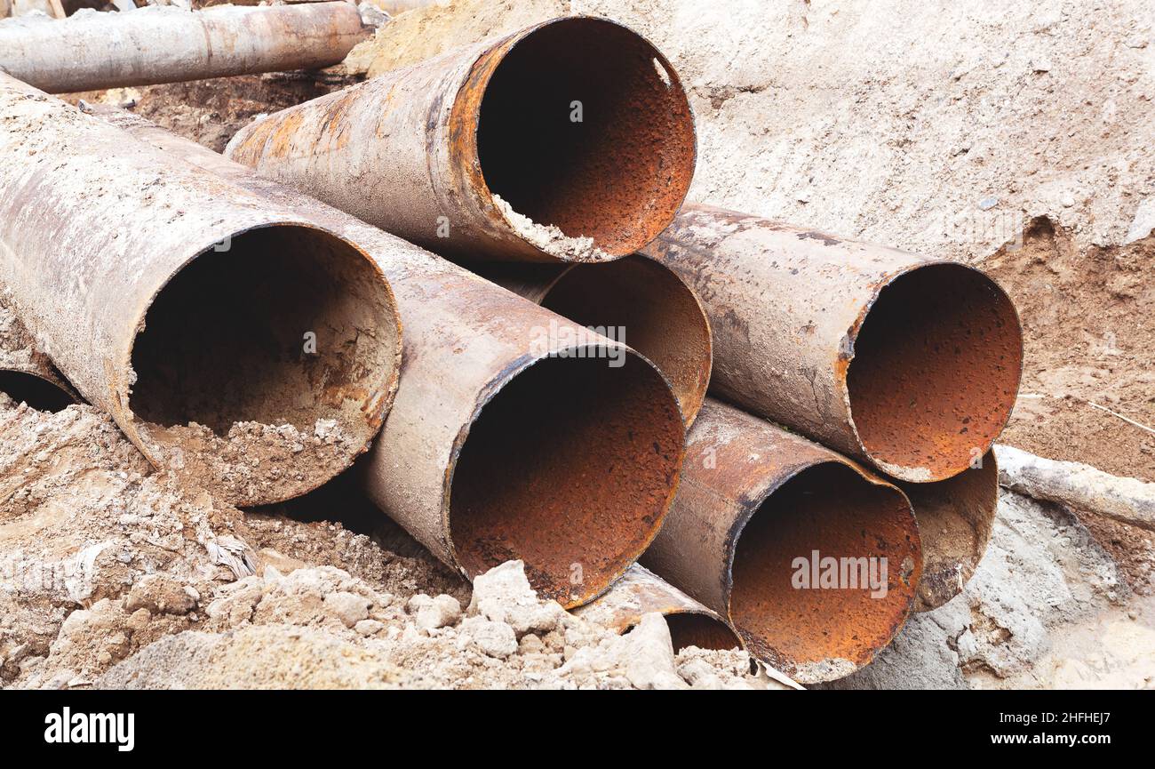 Fragments of old large water pipes. After many years of operation ...
