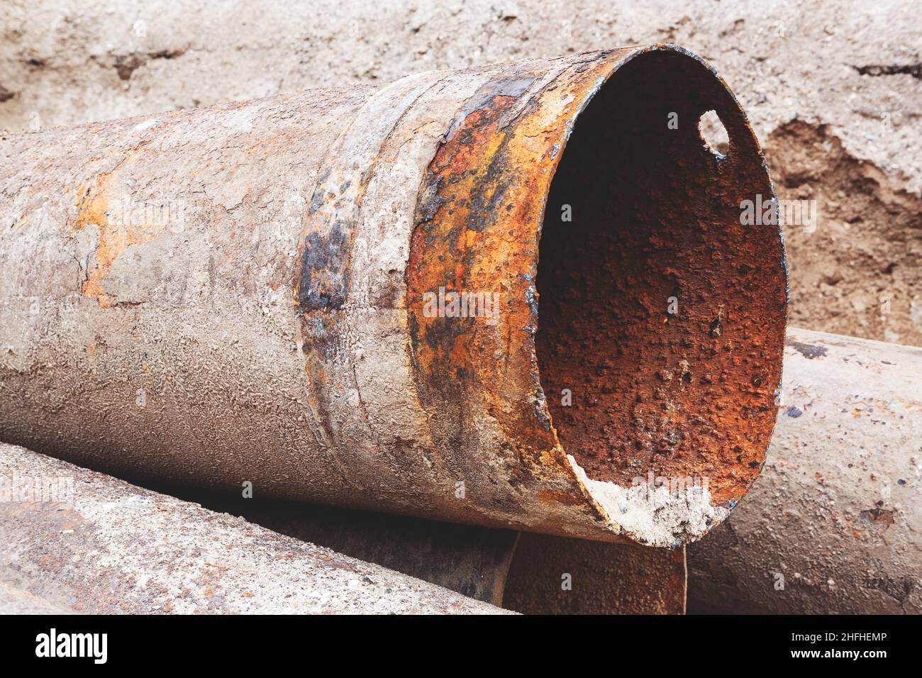 Fragments of old large water pipes. After many years of operation ...