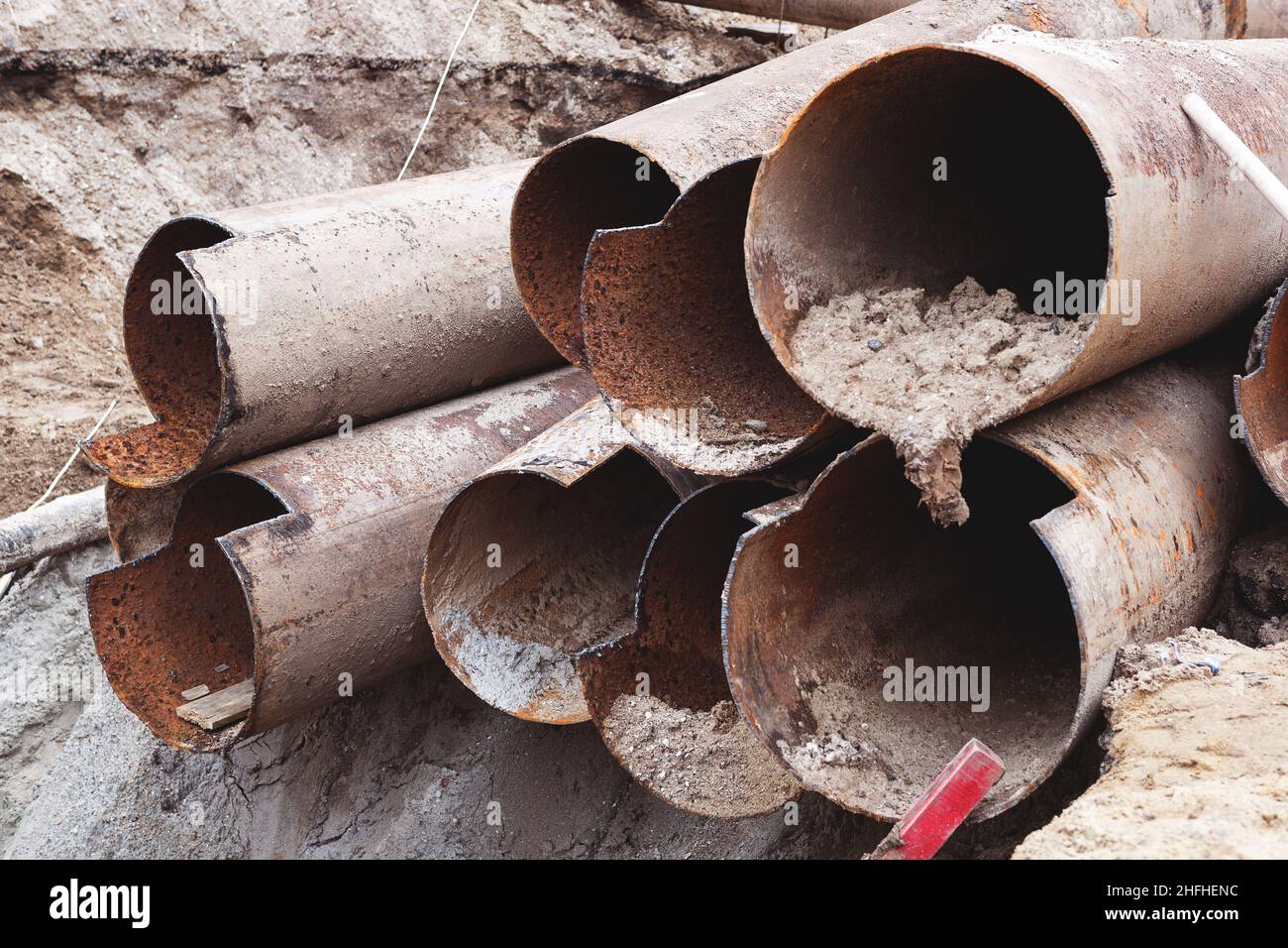 Fragments of old large water pipes. After many years of operation ...
