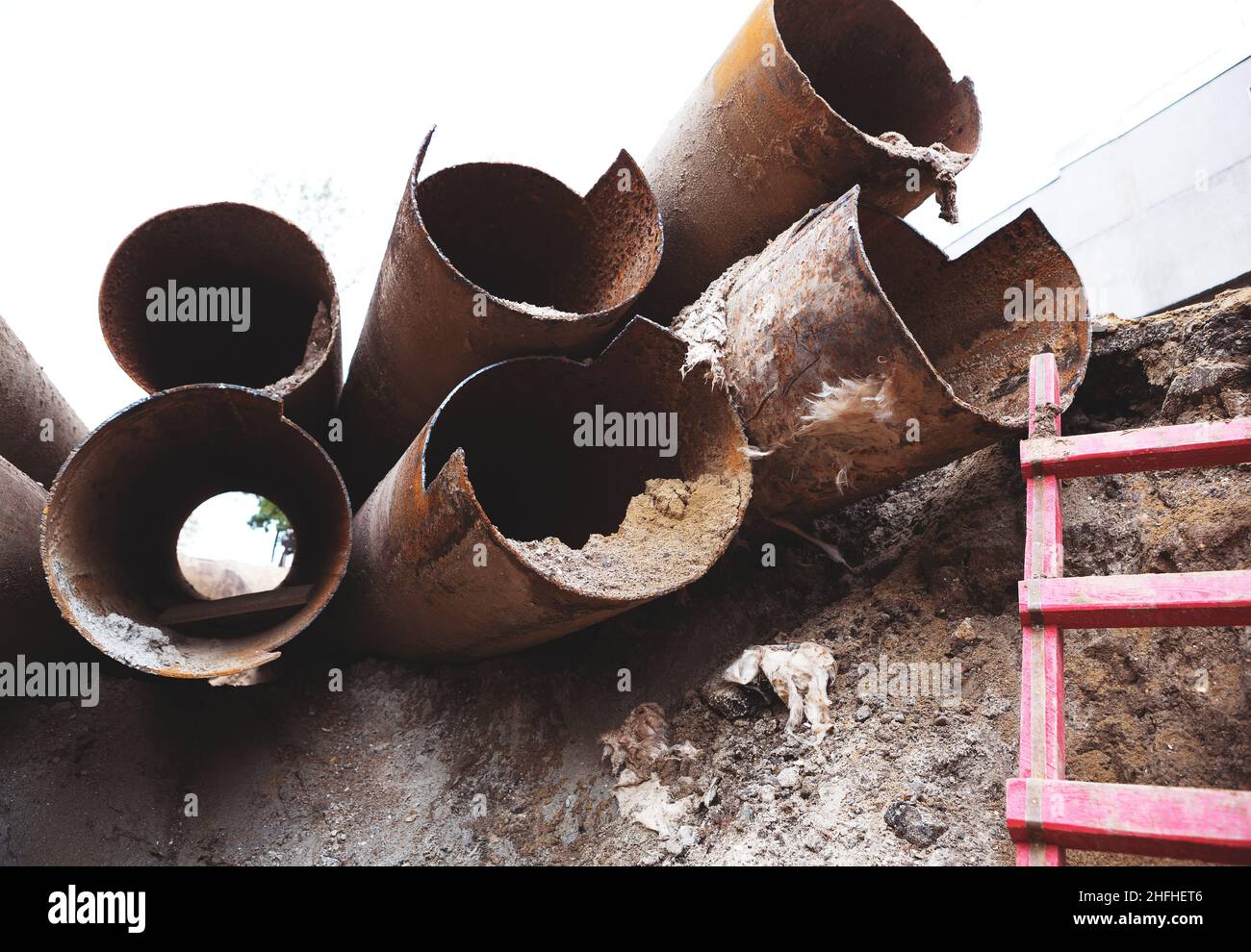 Fragments of old large water pipes. After many years of operation ...