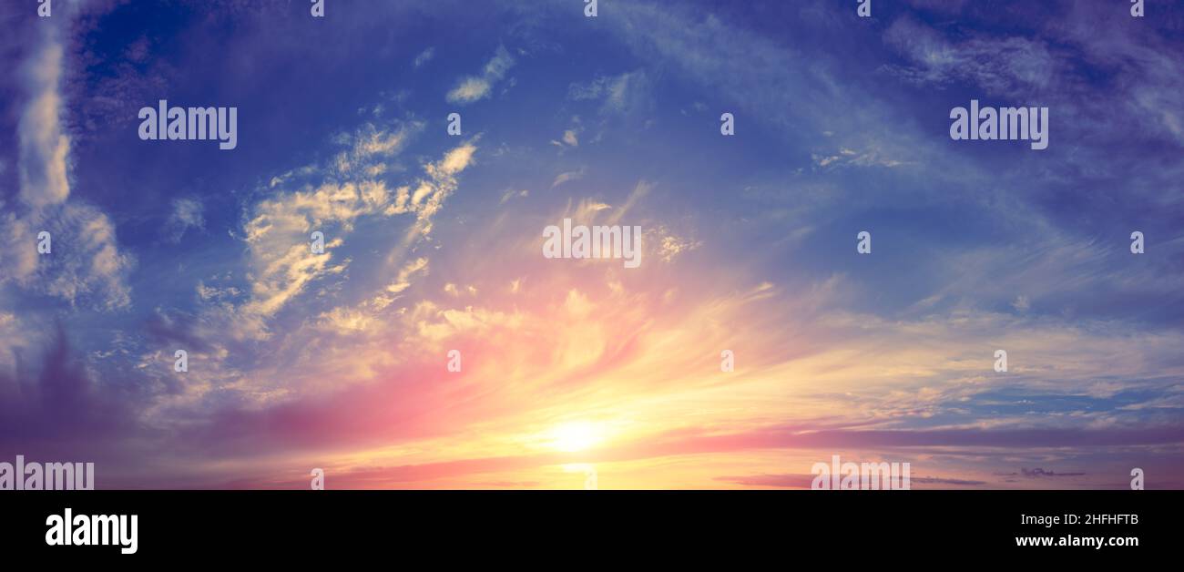 Panorama of a colorful cloudy sky at sunset. Sky texture. Abstract ...