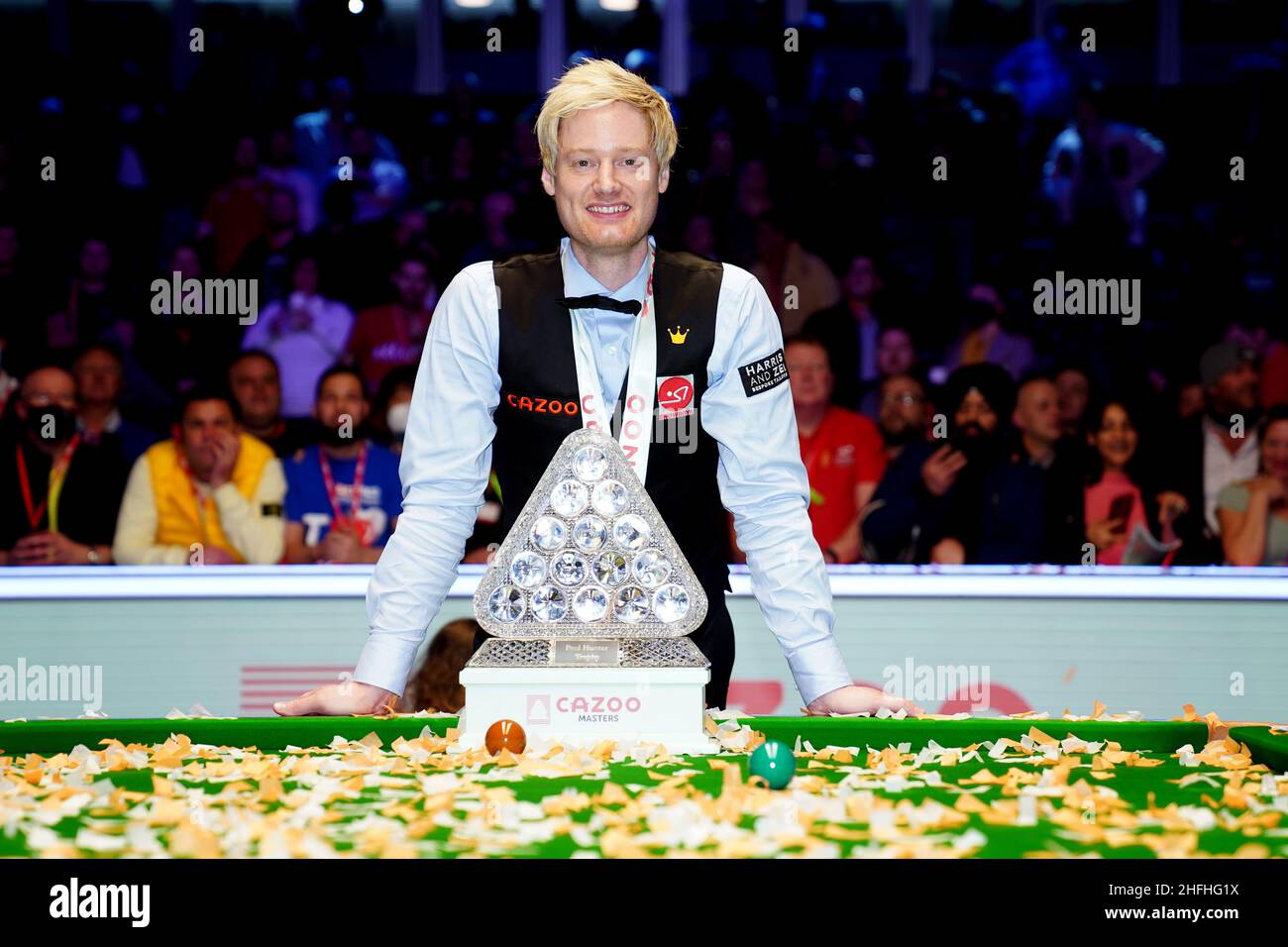 Neil Robertson celebrates with the Paul Hunter trophy after defeating ...