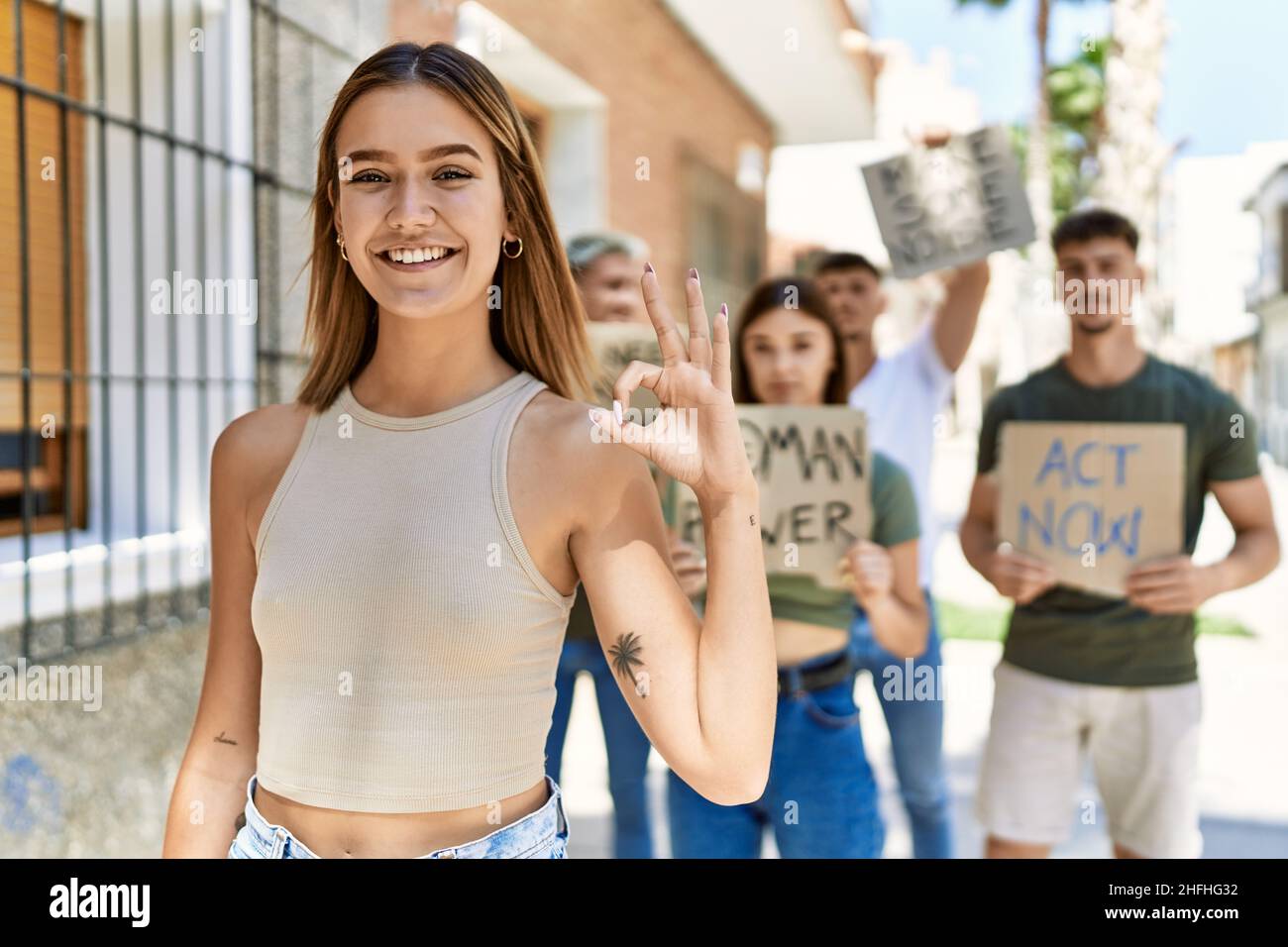 Group of people protesting and giving slogans at the street doing ok ...