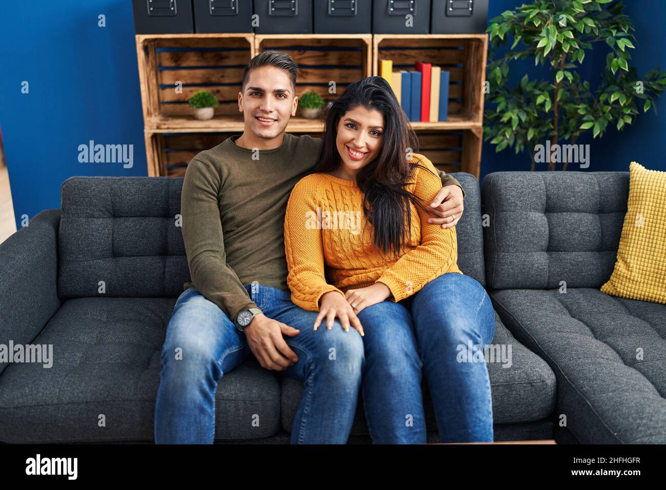 Positive arab couple sitting hi-res stock photography and images - Alamy