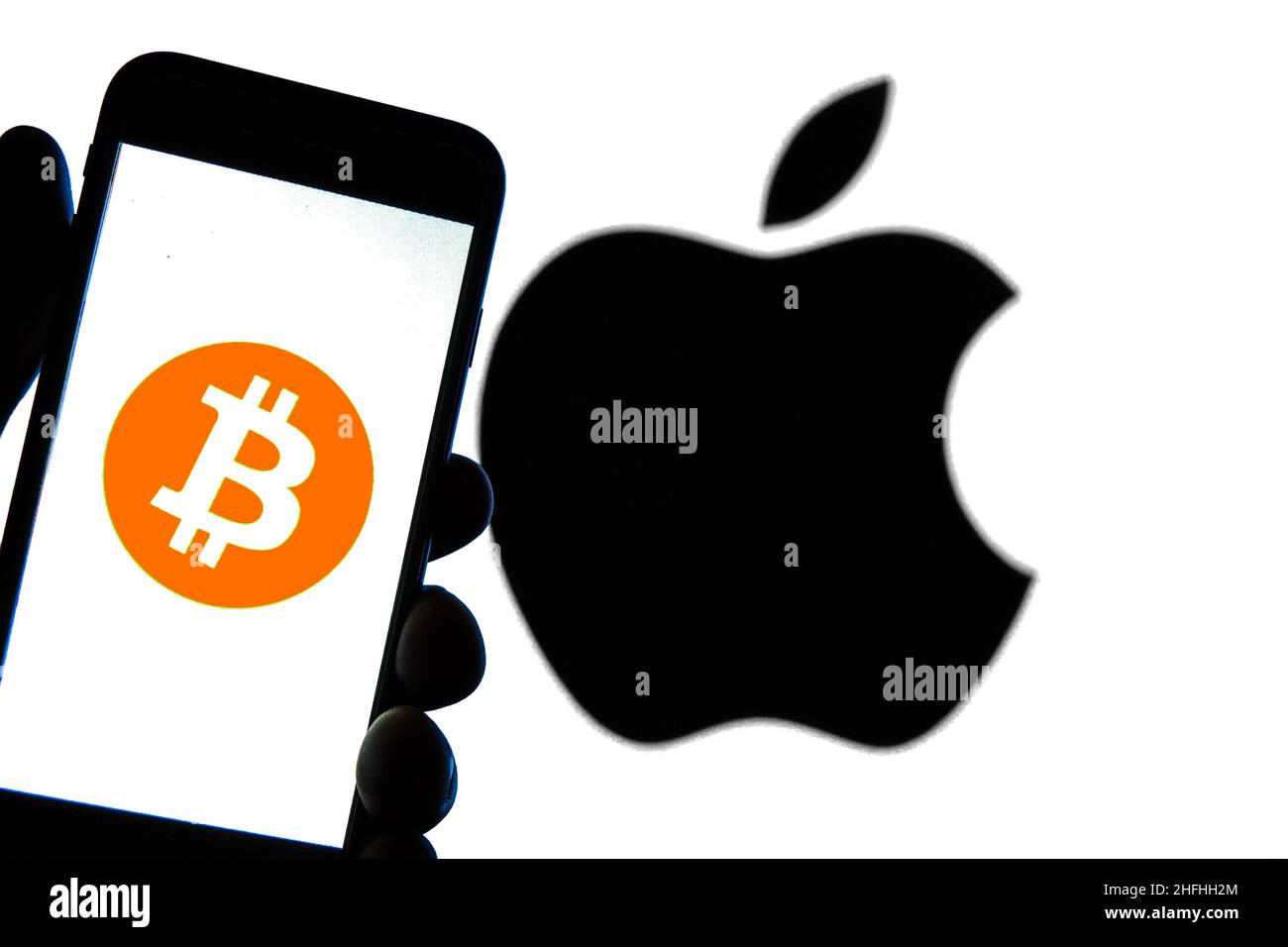In this photo illustration a Bitcoin logo seen displayed on a ...