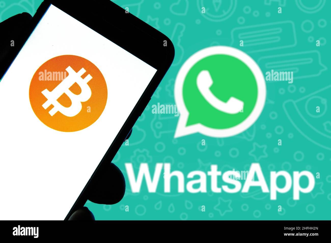 In this photo illustration a Bitcoin logo seen displayed on a ...