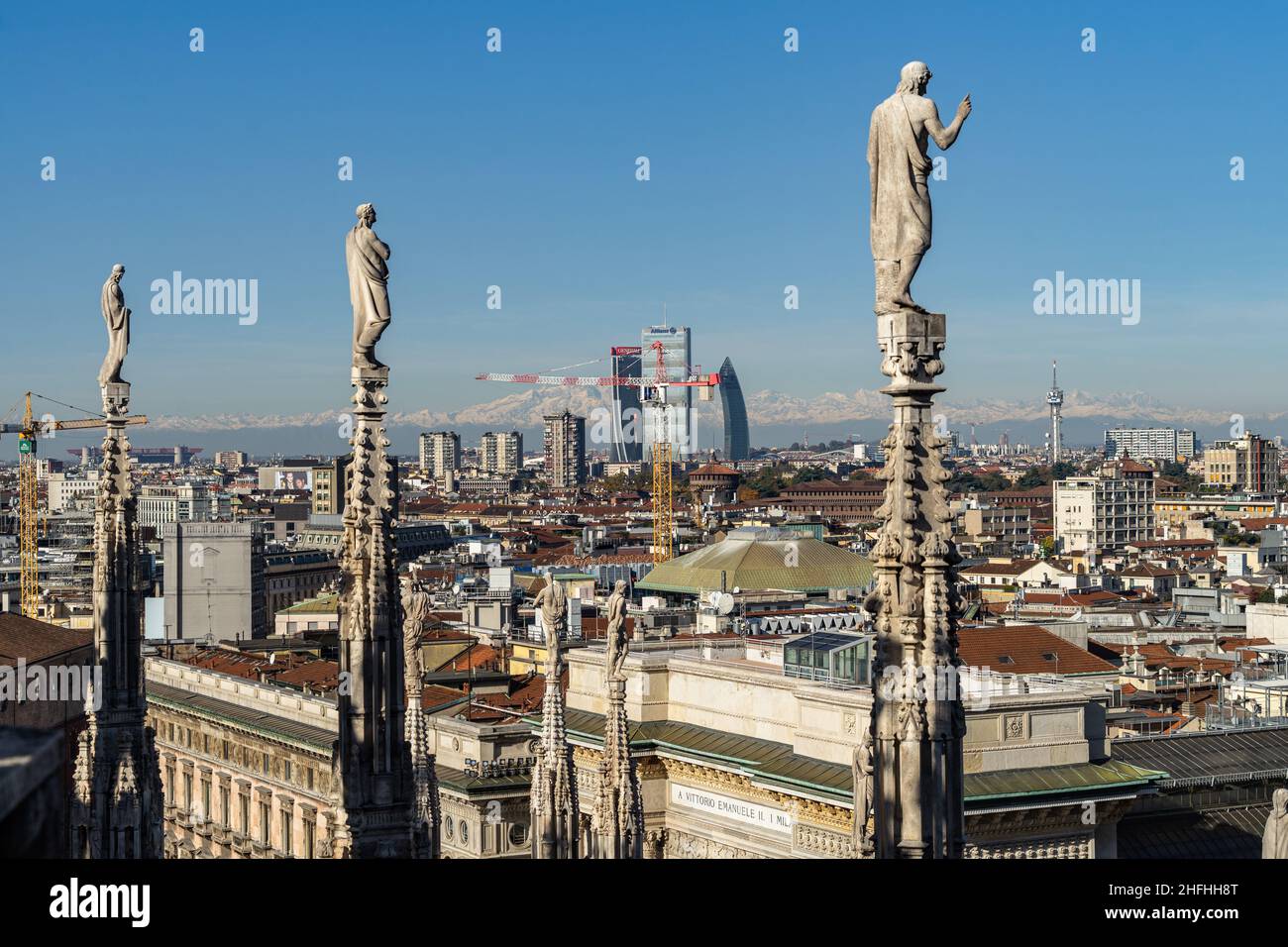 Scenic view of Milan historic center and modern skyline from the spires ...