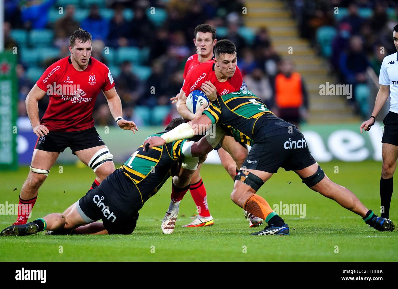 Ulster's James Hume (centre) is tackled by Northampton Saints' Alex ...