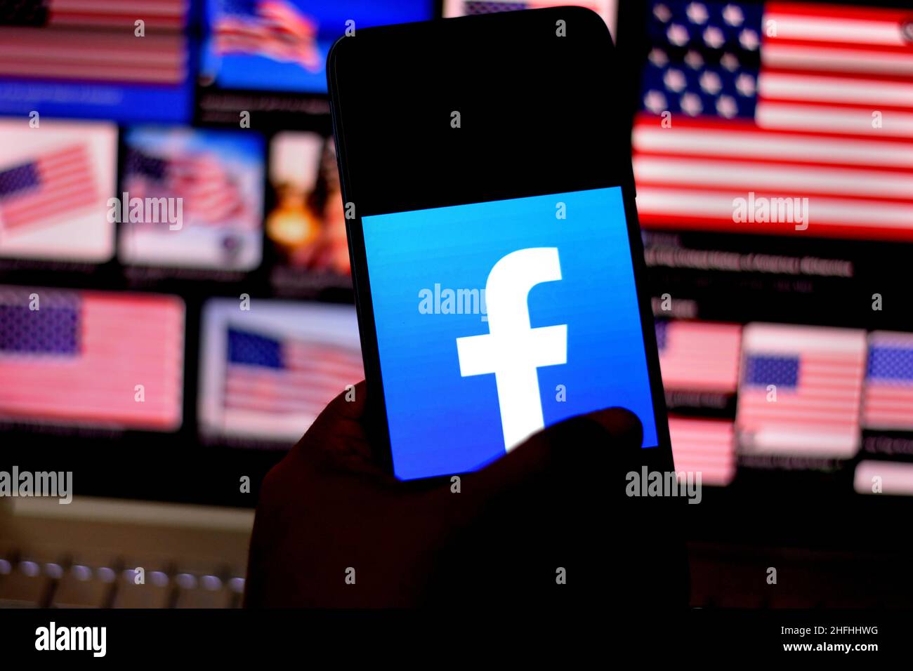 In this photo illustration, a Facebook logo seen displayed on a ...