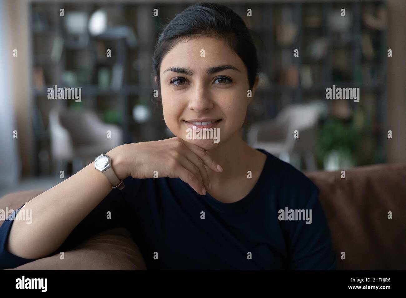 Happy beautiful relaxed young Indian woman looking at camera Stock ...