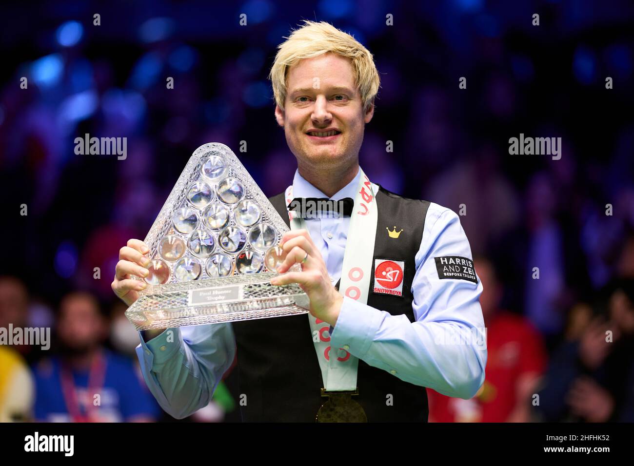 Neil Robertson celebrates with the Paul Hunter trophy after defeating ...