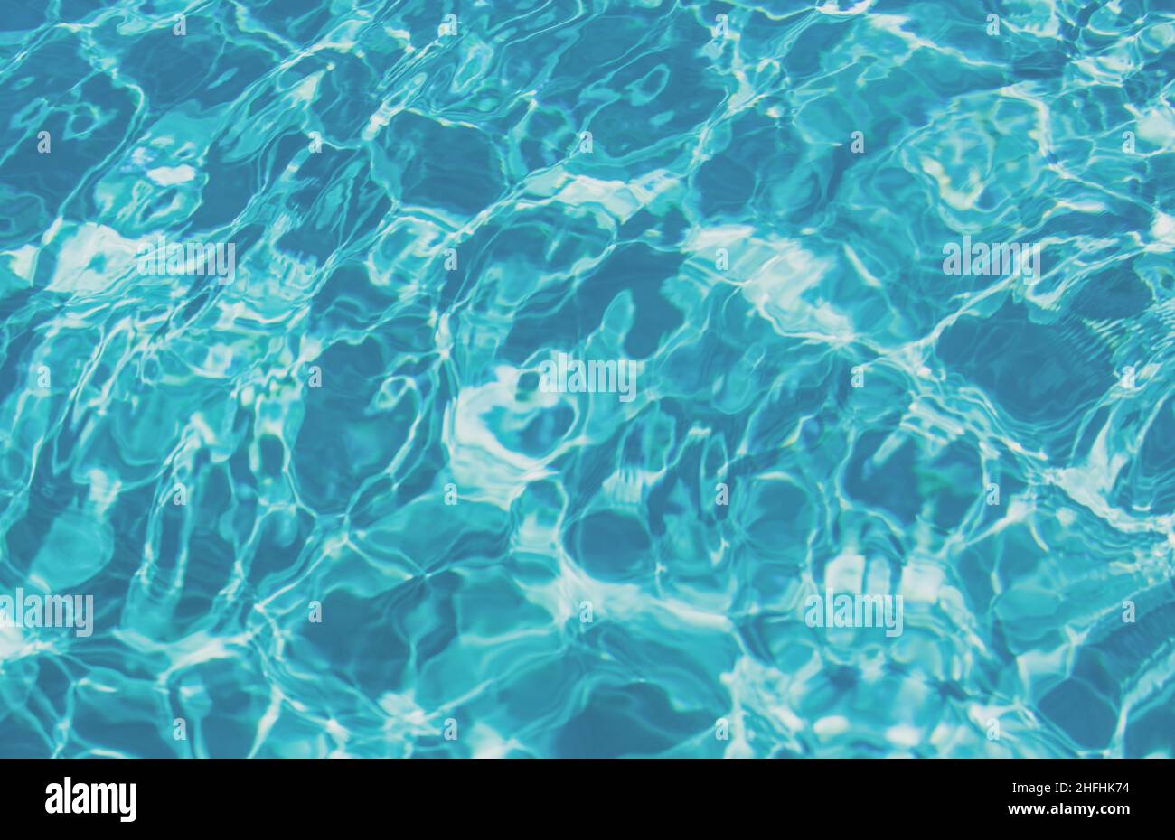 Abstract ripple wave and clear turquoise water surface in swimming pool ...