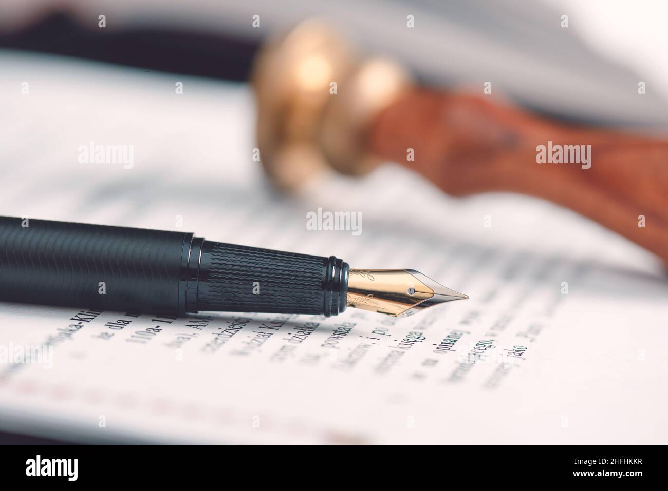 Law, notary background theme. Fountain pen and handmade paper on desk ...