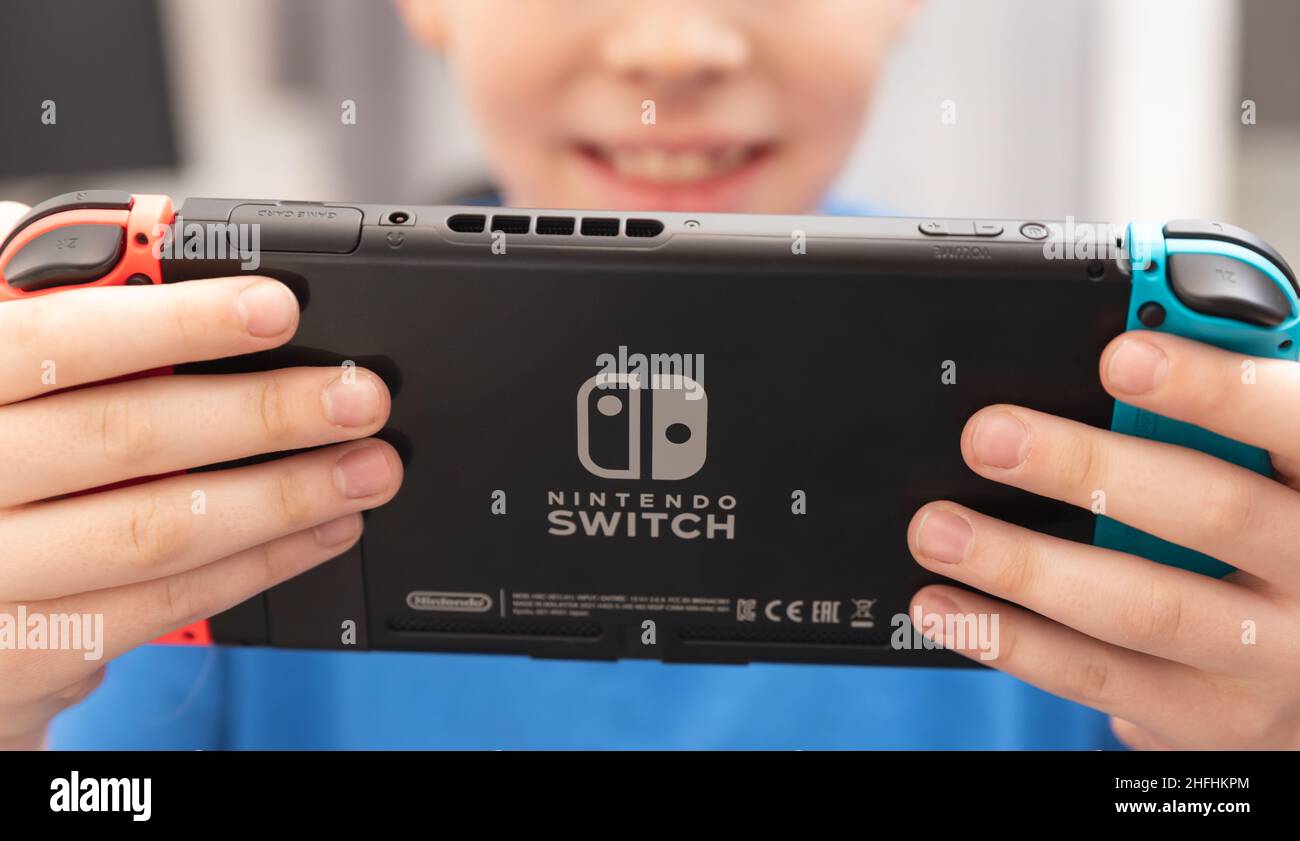 Wroclaw, Poland - JAN 22, 2022: Boy plays Nintendo Switch console ...