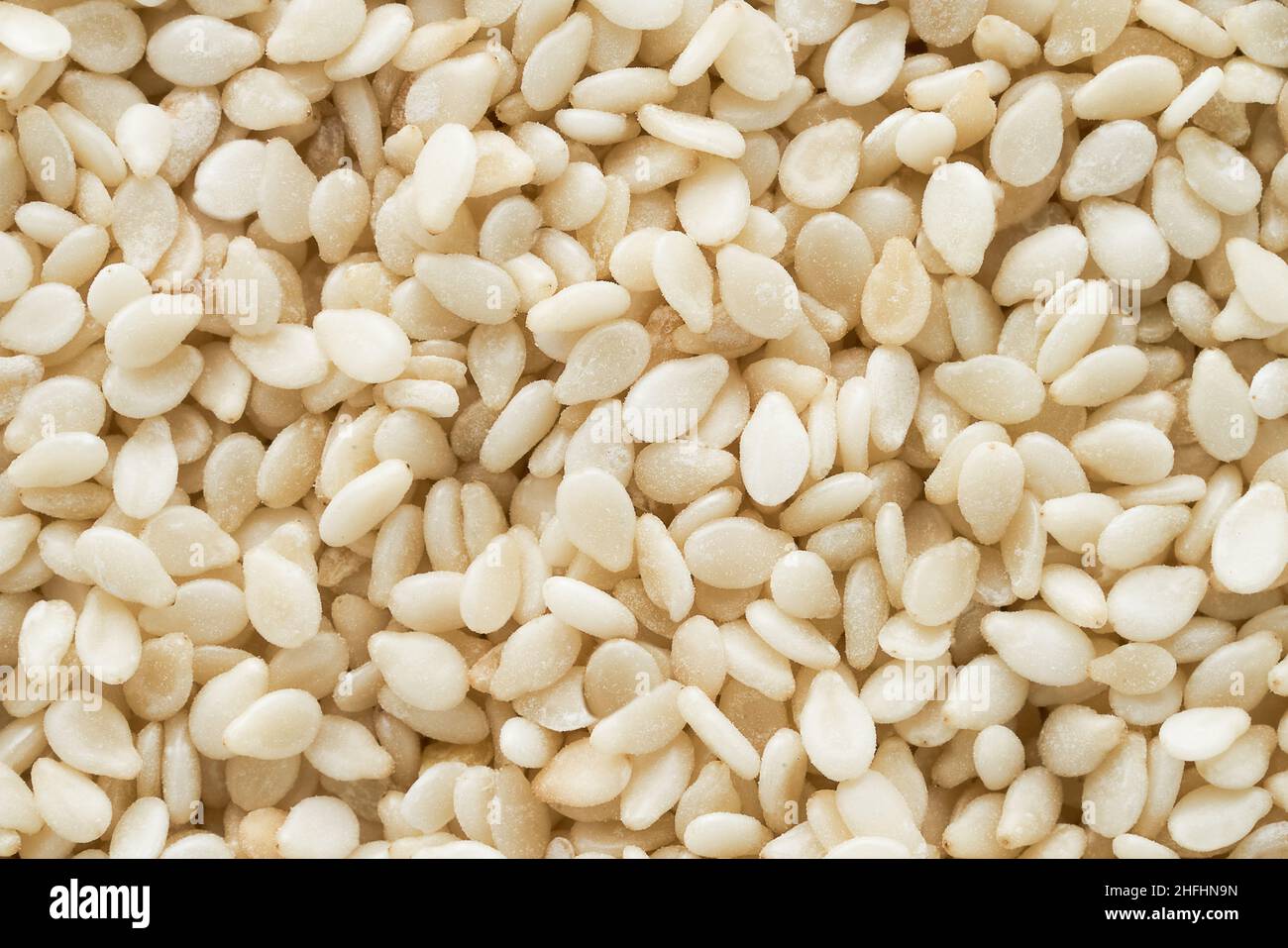 Sesame seeds as background. Flat lay, copy space Stock Photo - Alamy