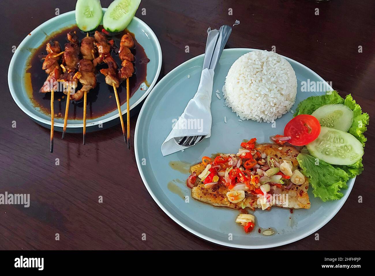 Chicken Satay and Grill Fish at Malacca Toast, Jakarta, Indonesia Stock ...