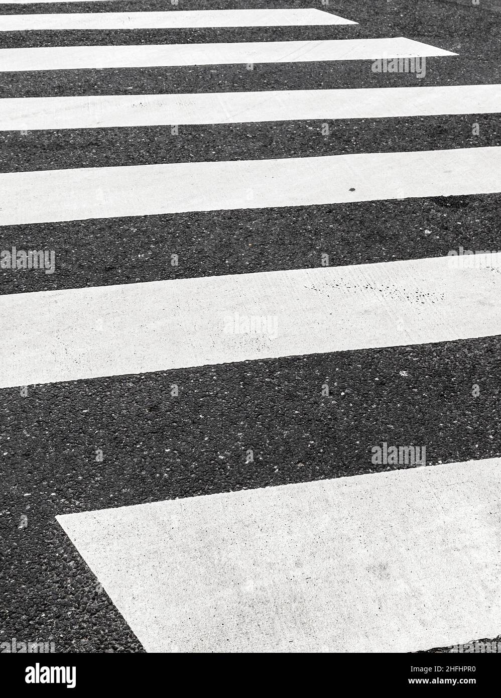 pedestrian crossing marked with white paint Stock Photo - Alamy