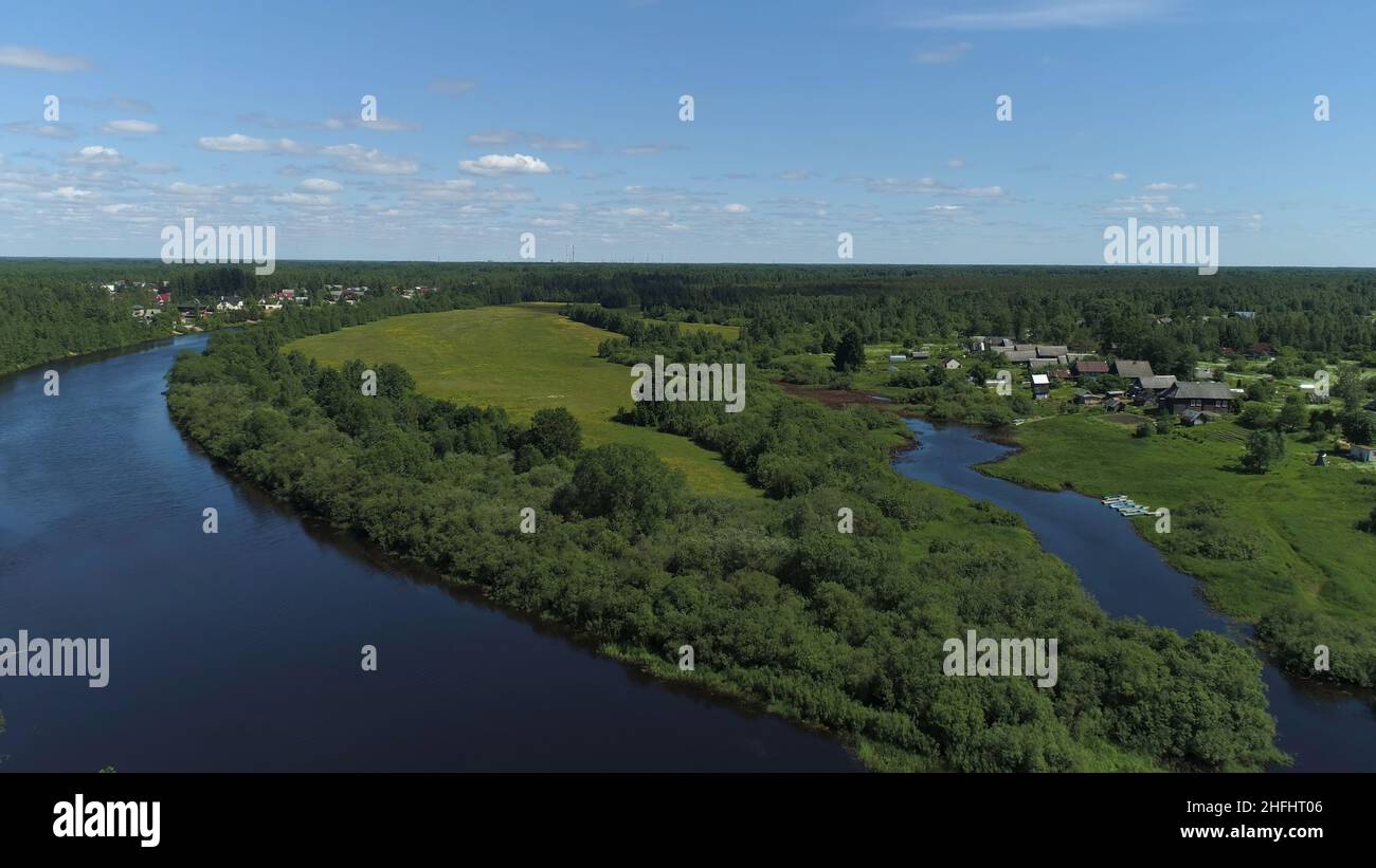 Aerial view of natural landscape with a river flowing among the small ...