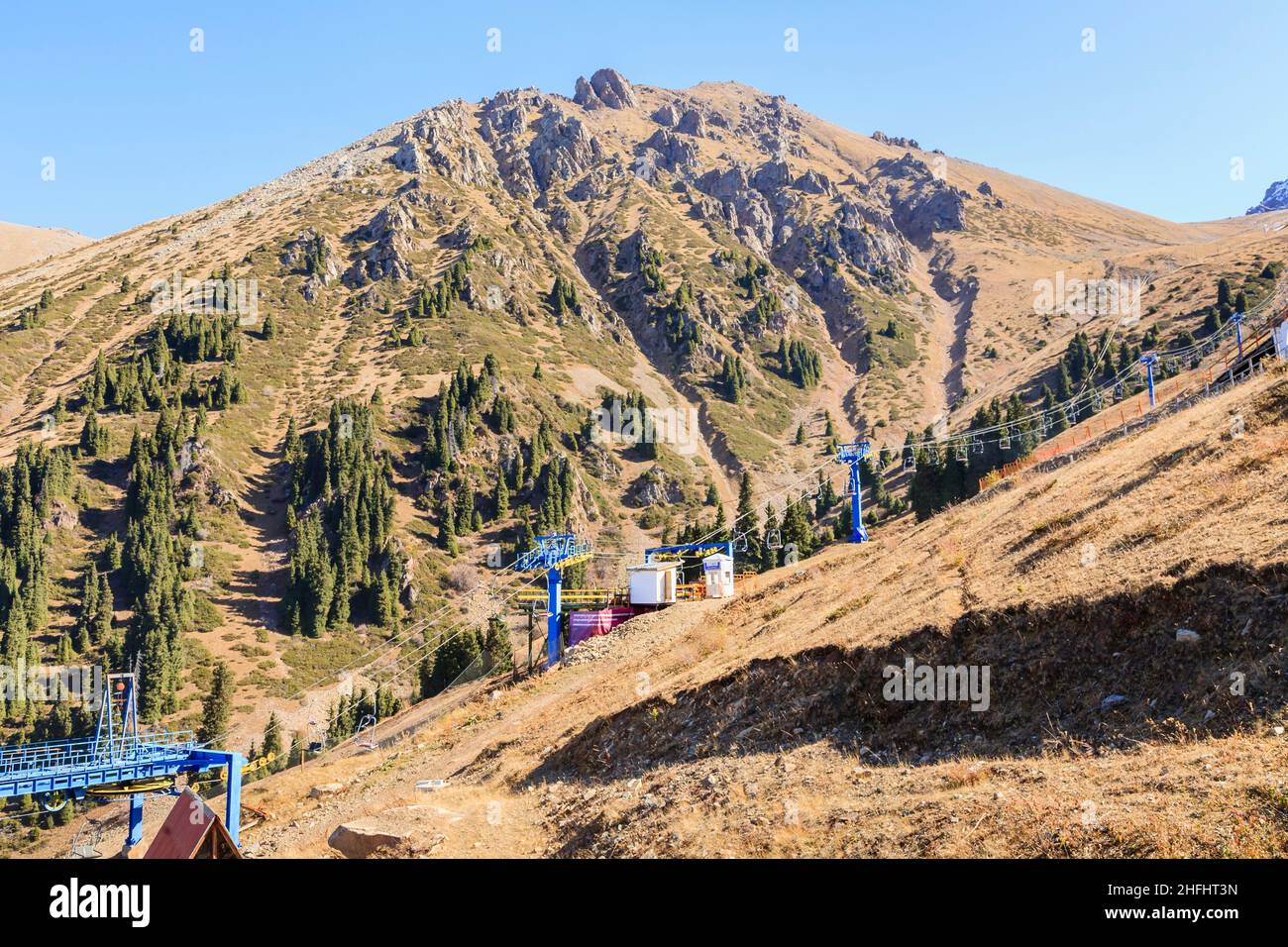 Ski lift in mountain scenery in the Himalayan Zailiyskiy Alatau (Ile ...