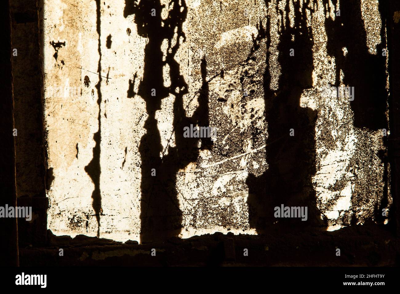 grungy window with carbon black symbolizes the dirt of iron works ...